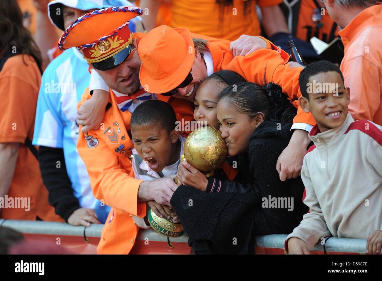 Dutch fans celebrate on the stand during the 2010 FIFA World Cup group ...
