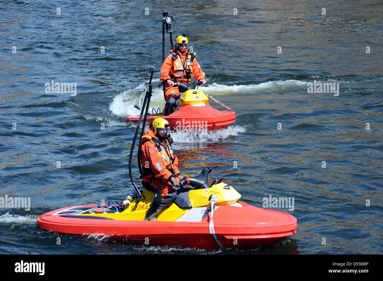 Lifeguards are on duty on the water next to the royal palace in ...