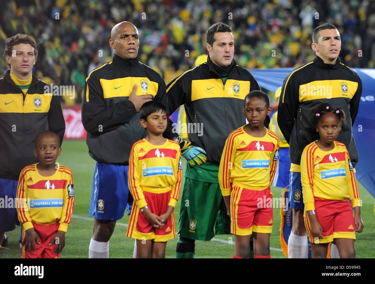 Brazilian Elano (L-R), Maicon, goalkeeper Julio Cesar and captain Lucio ...