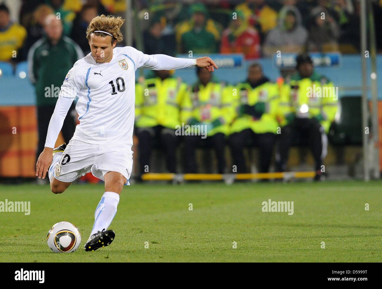 Uruguay's Diego Forlan shoots during the 2010 FIFA World Cup group A ...