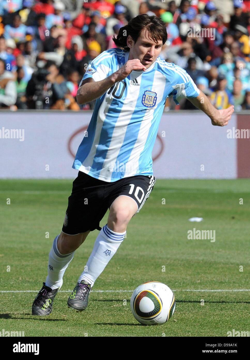 Argentina's Lionel Messi controls the ball during the 2010 FIFA World ...