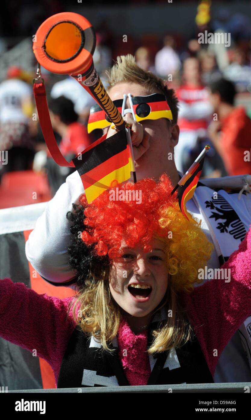 German fans celebrate on the stand prior to the 2010 FIFA World Cup ...