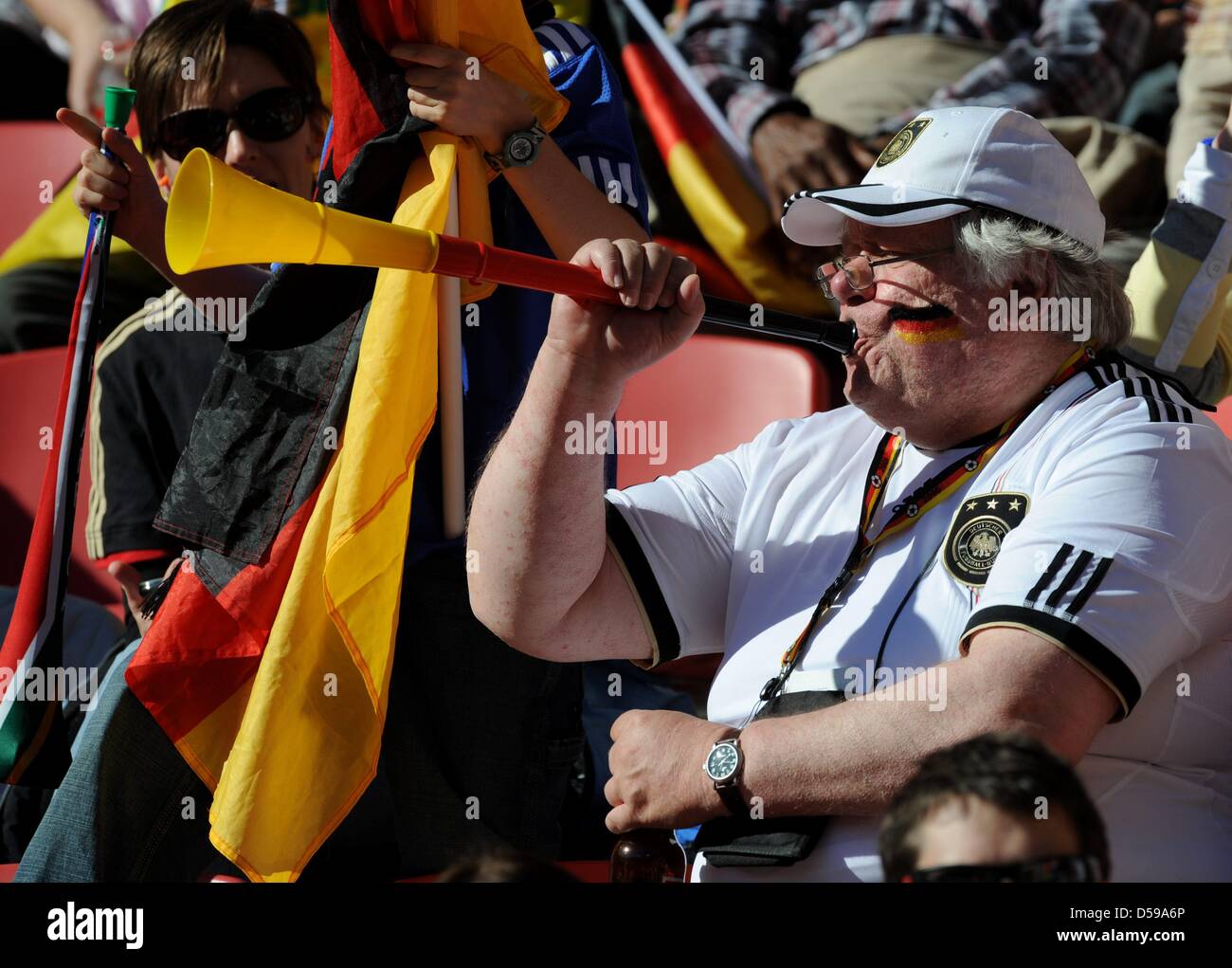 German fans celebrate on the stand prior to the 2010 FIFA World Cup ...