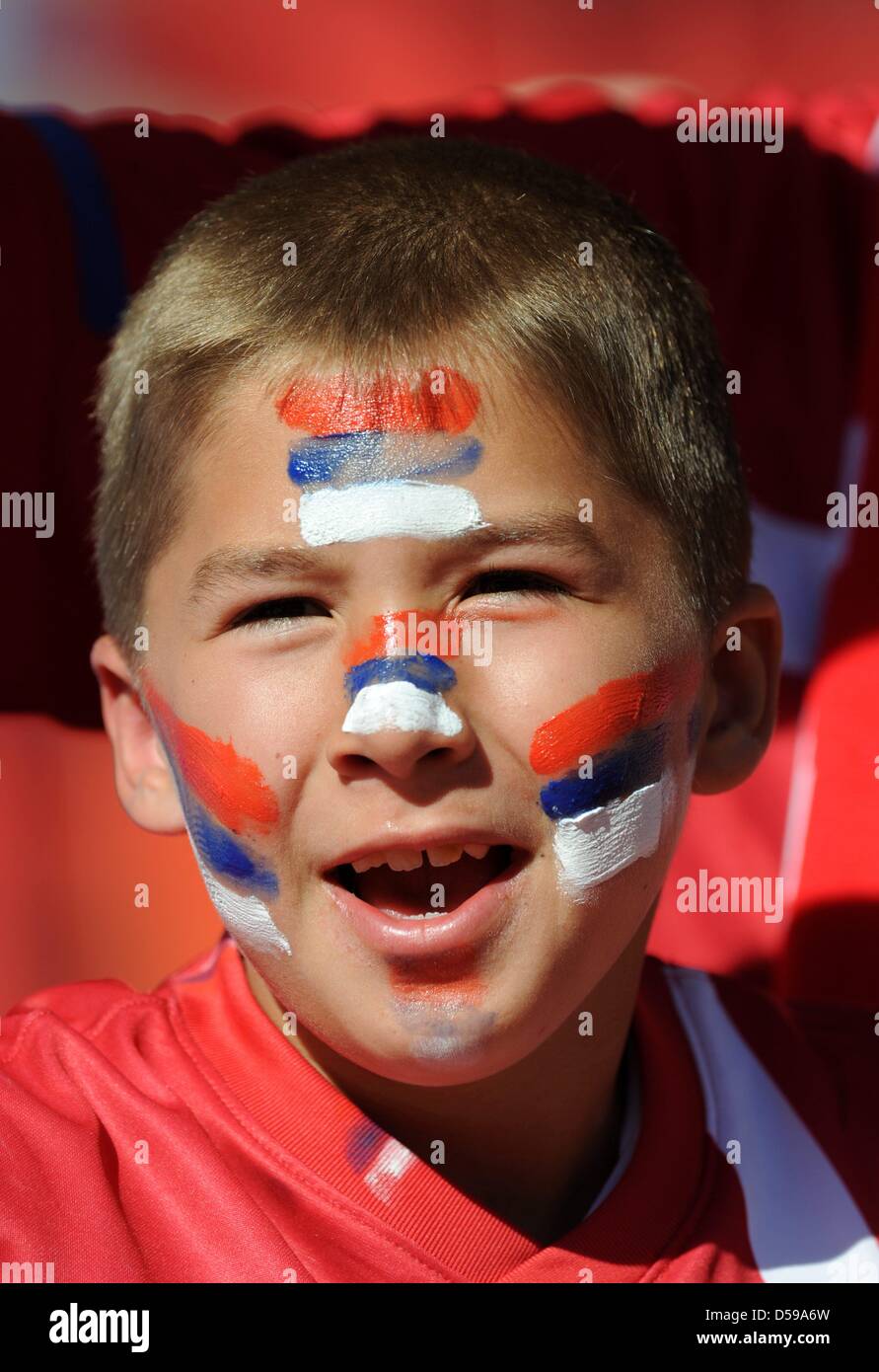 A young Serbian fan celebrates on the stand prior to the 2010 FIFA ...