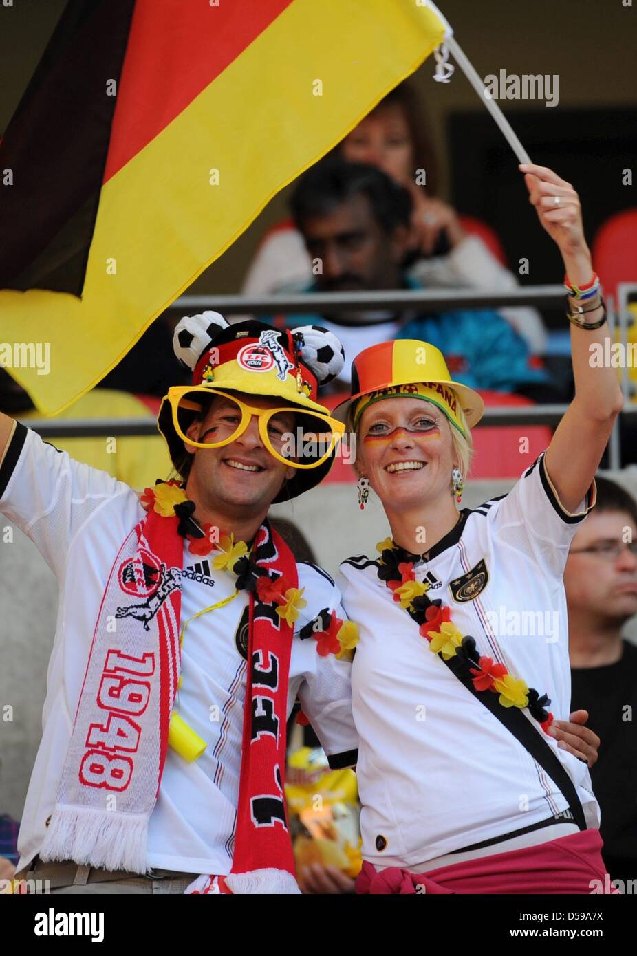German fans celebrate on the stand prior to the 2010 FIFA World Cup ...