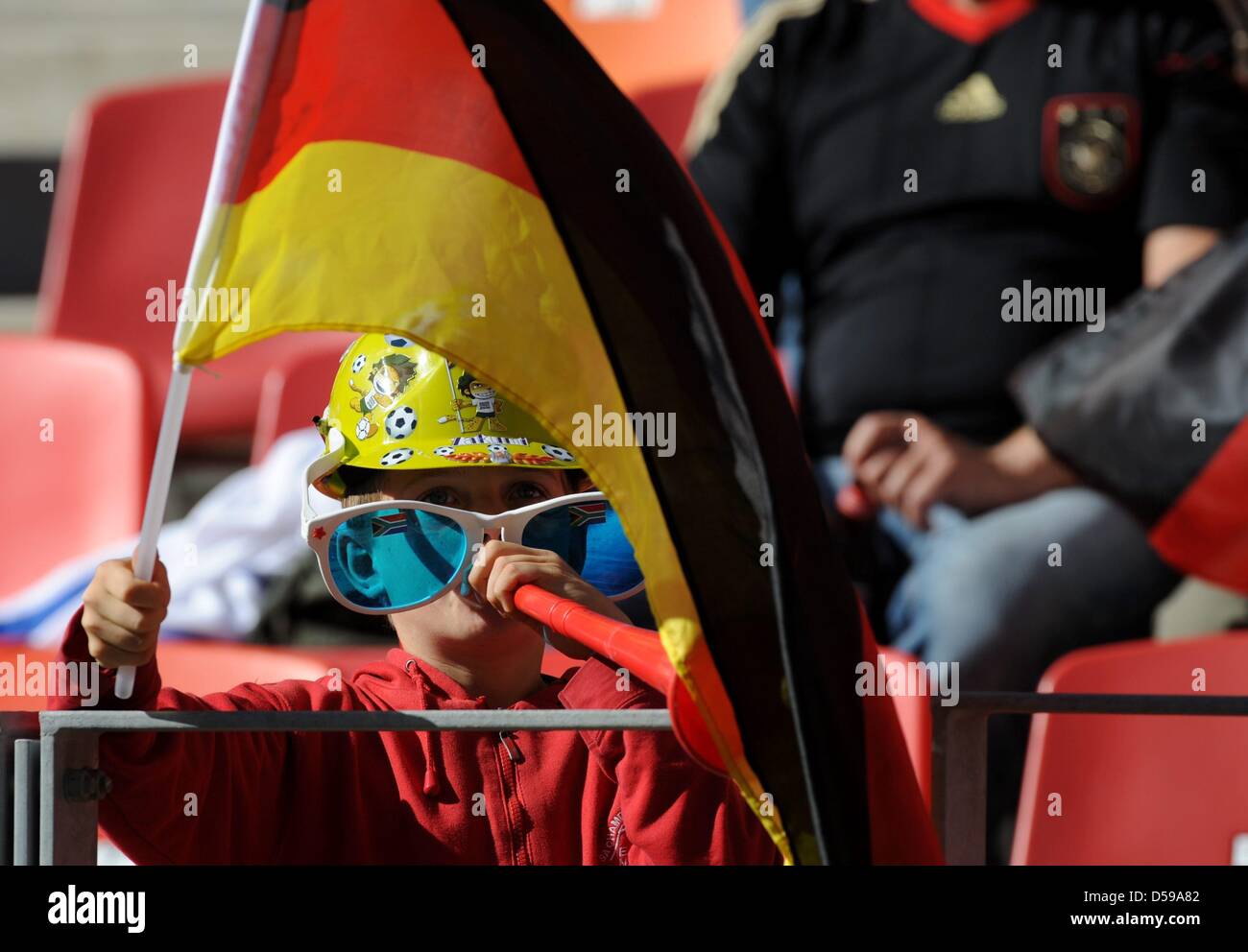 German fans celebrate on the stand prior to the 2010 FIFA World Cup ...