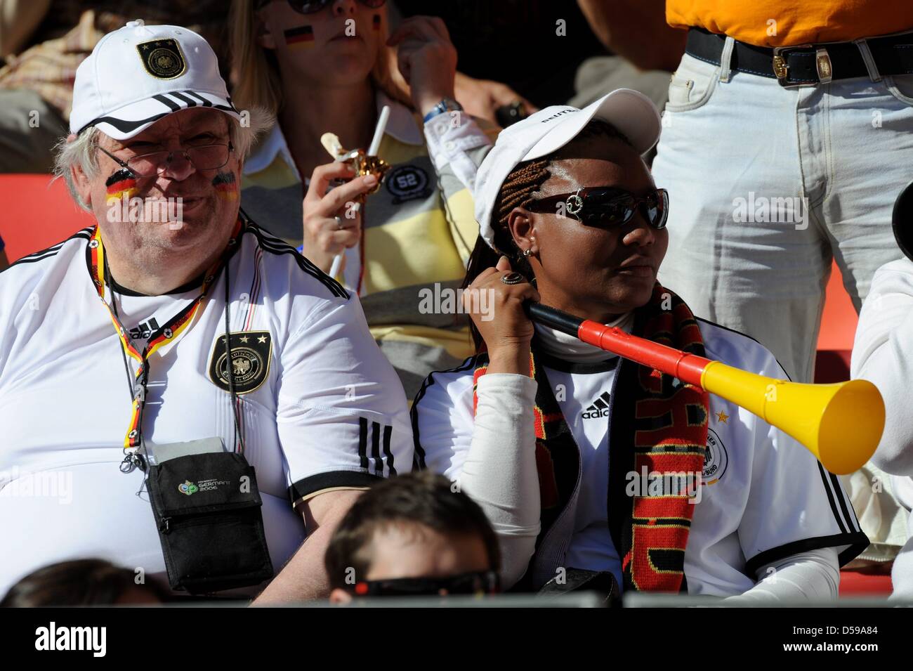 German fans celebrate on the stand prior to the 2010 FIFA World Cup ...