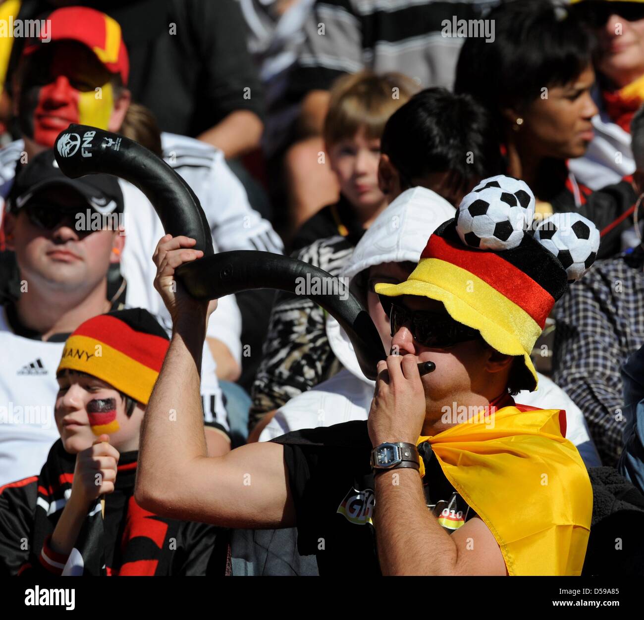German fans celebrate on the stand prior to the 2010 FIFA World Cup ...