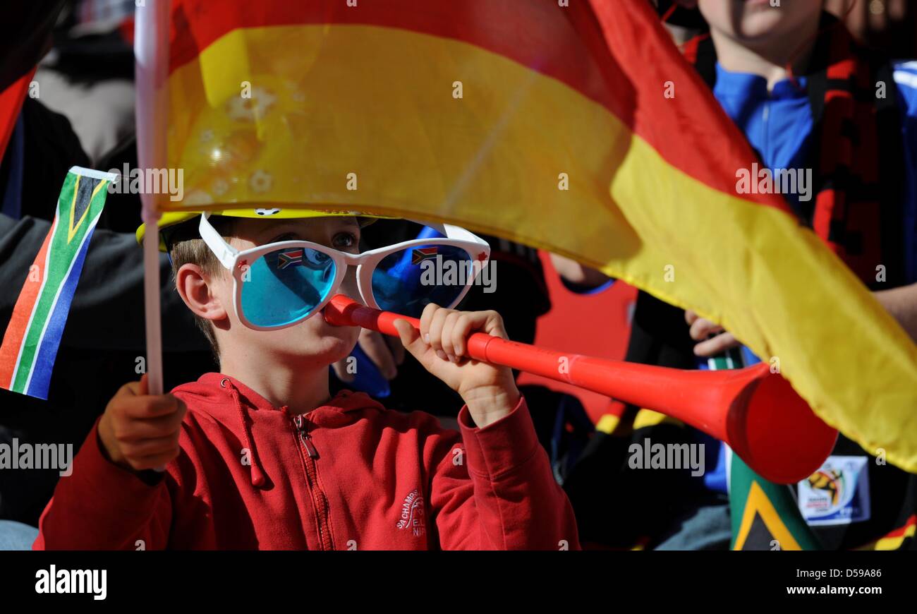 German fans celebrate on the stand prior to the 2010 FIFA World Cup ...