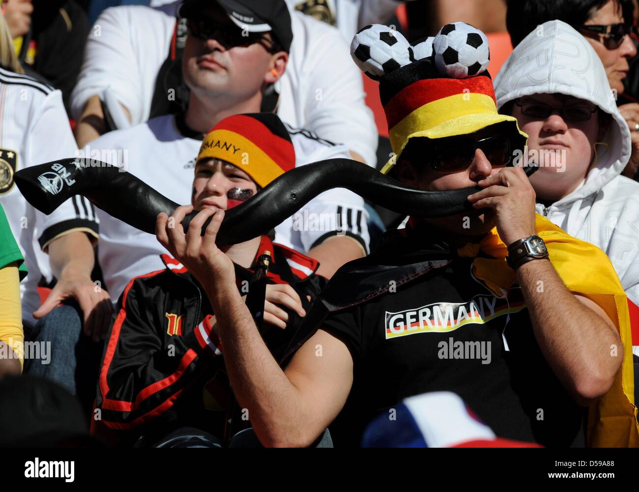 German fans celebrate on the stand prior to the 2010 FIFA World Cup ...