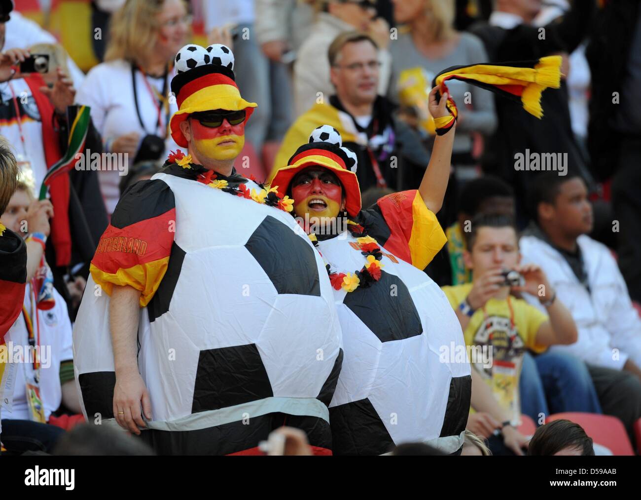 German fans celebrate on the stand during the 2010 FIFA World Cup group ...