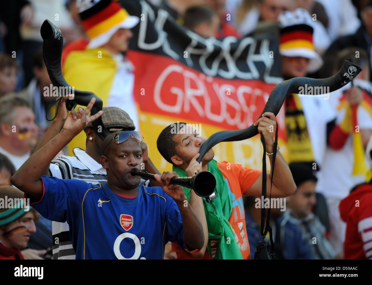 German fans celebrate on the stand during the 2010 FIFA World Cup group ...