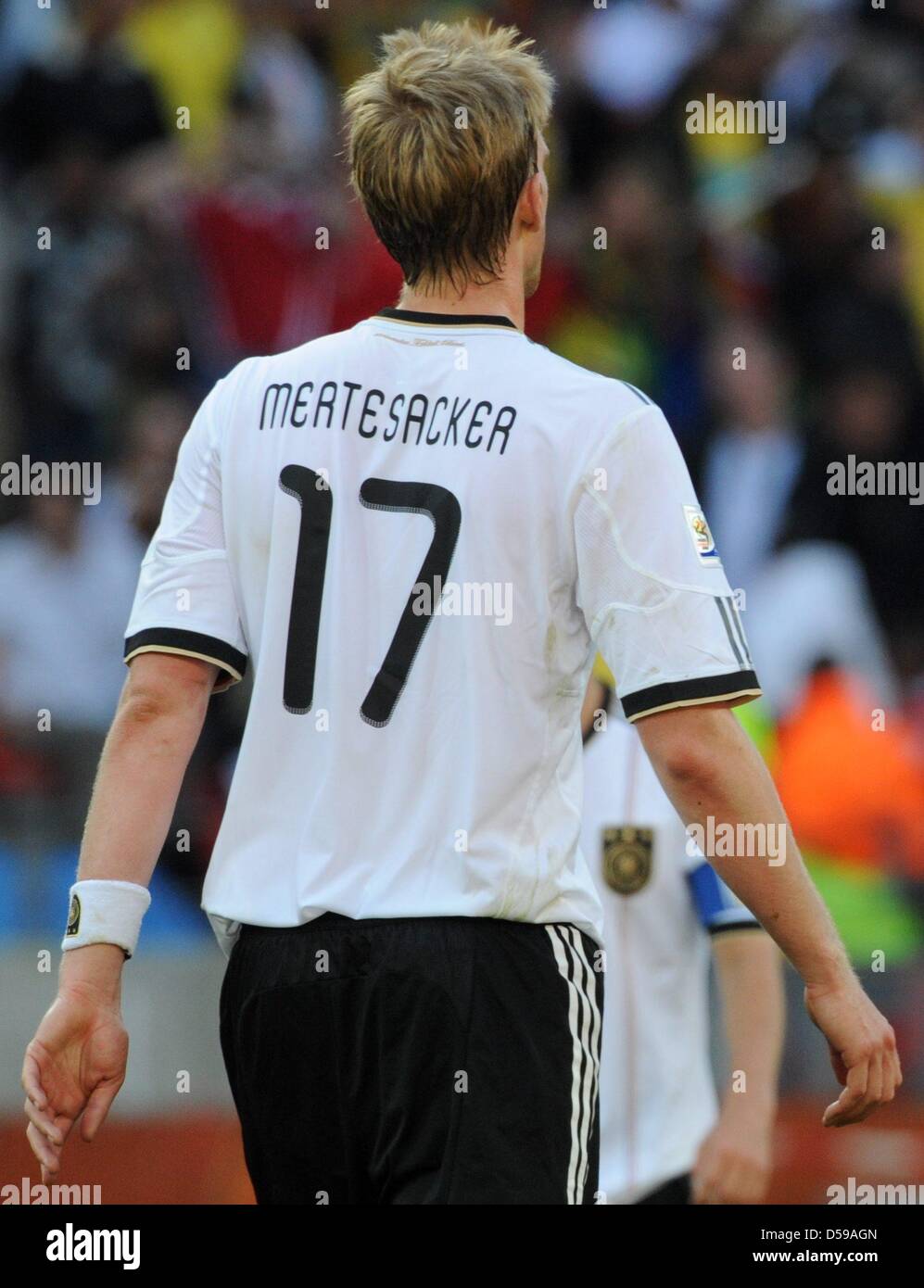 Germany's Per Mertesacker leaves the pitch after the 2010 FIFA World ...