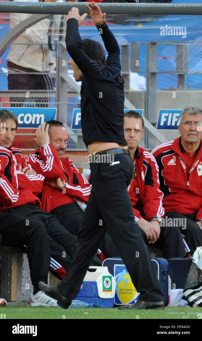 Germany's coach Joachim Loew reacts after the 2010 FIFA World Cup group ...