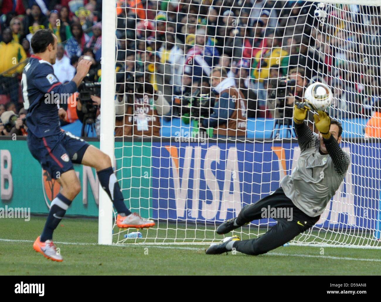 Slovenia's goalkeeper Samir Handanovic holds the ball in presence of ...