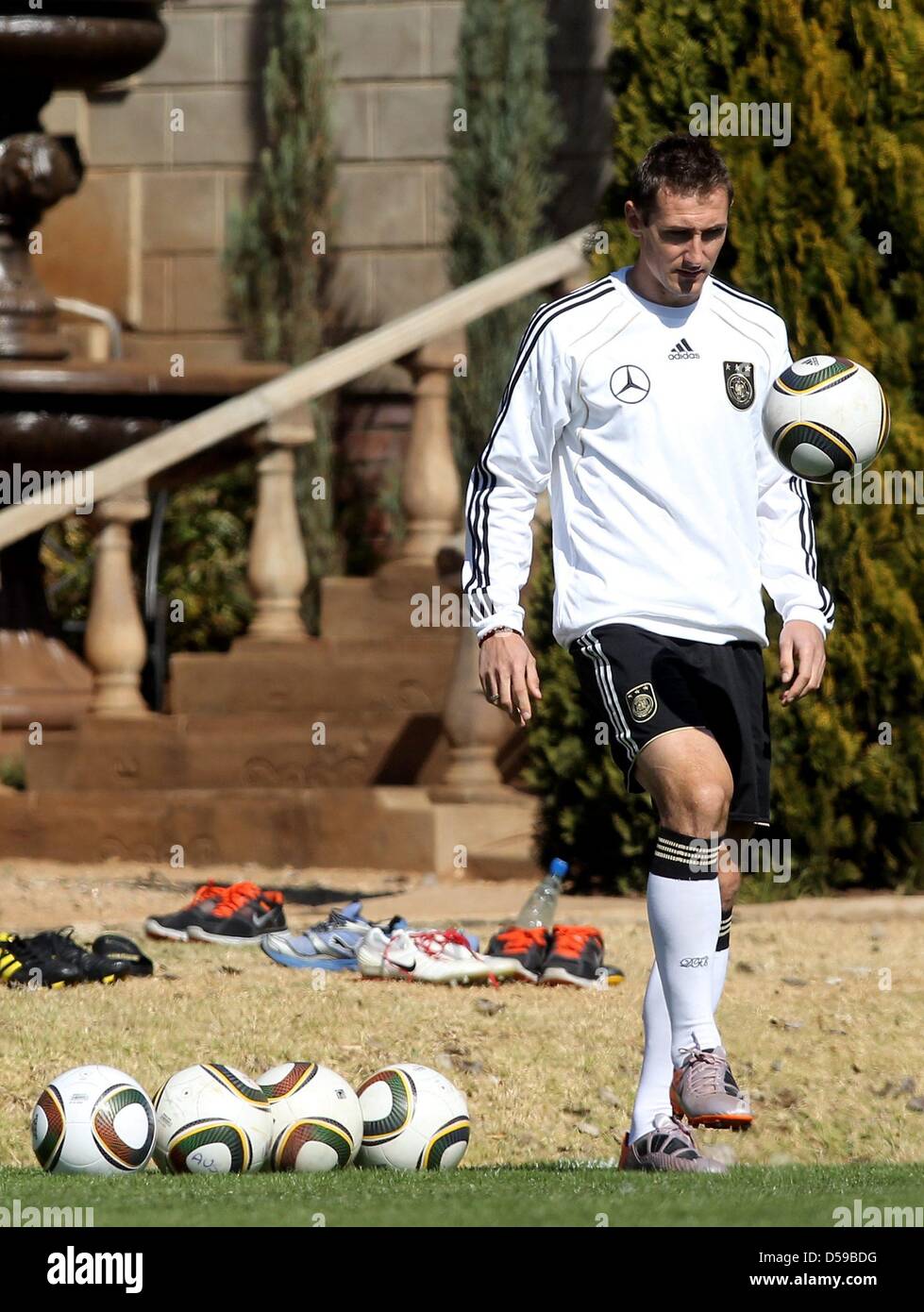 Germany's Miroslav Klose controls the ball during training at Velmore ...
