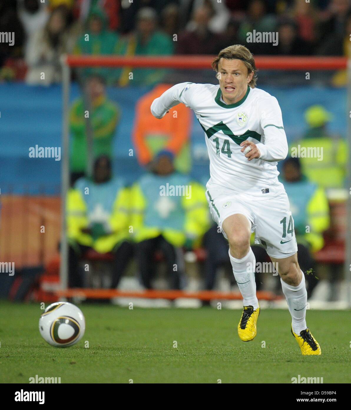 Zlatko Dedic of Slovenia controls the ball during the FIFA World Cup ...