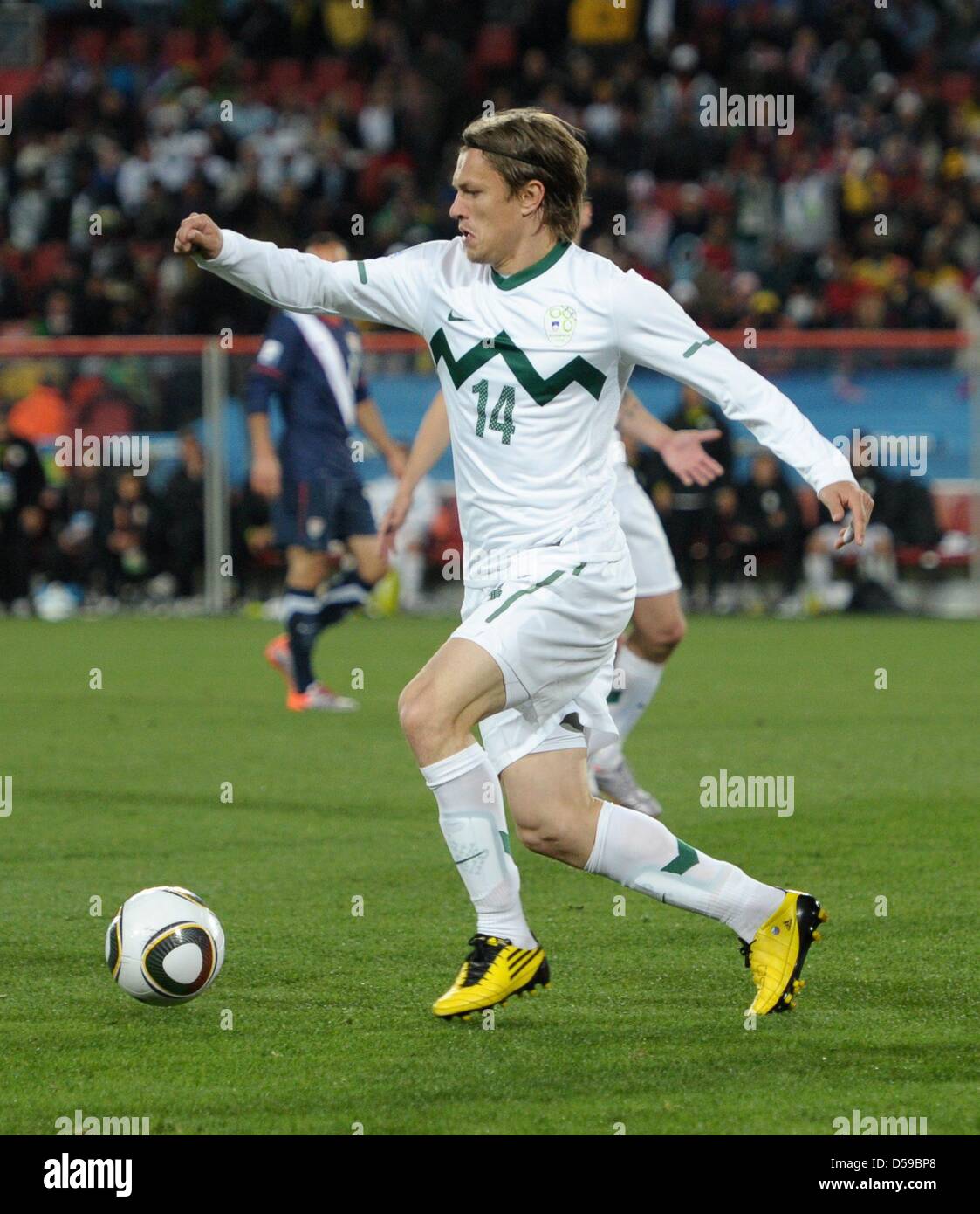 Zlatko Dedic of Slovenia controls the ball during the FIFA World Cup ...