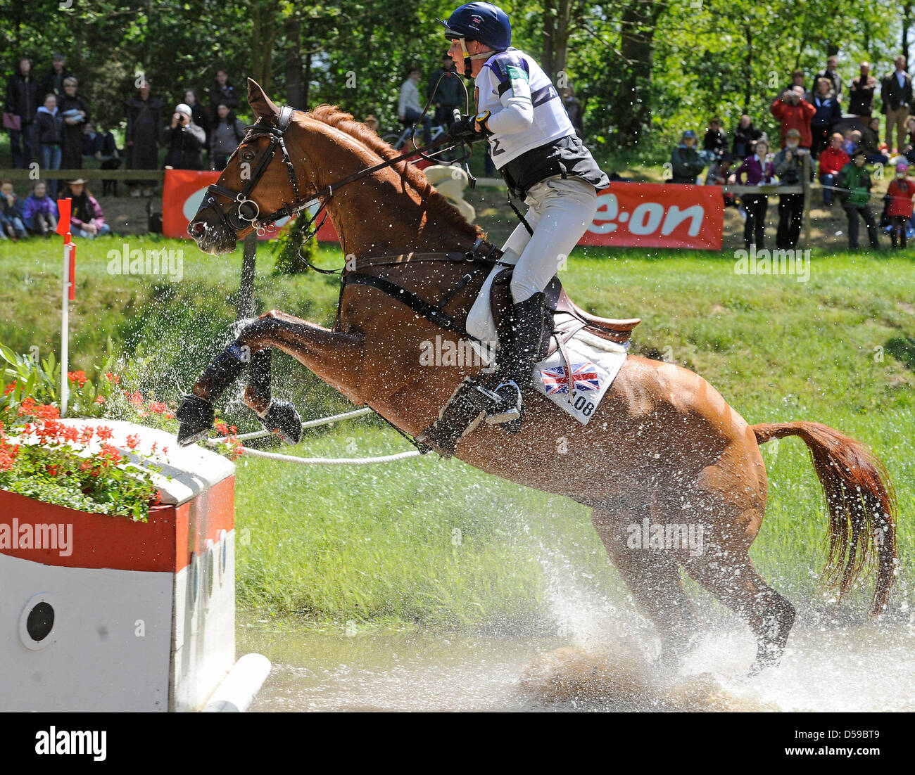 British equestrian Sharon Hunt and her horse 'Tankers Town' overcome an ...