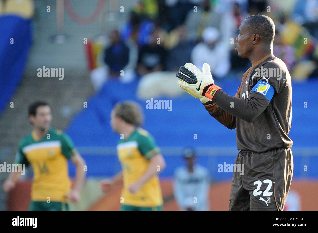 Richard Kingson (R) of Ghana reacts after Holman of Australia scored ...