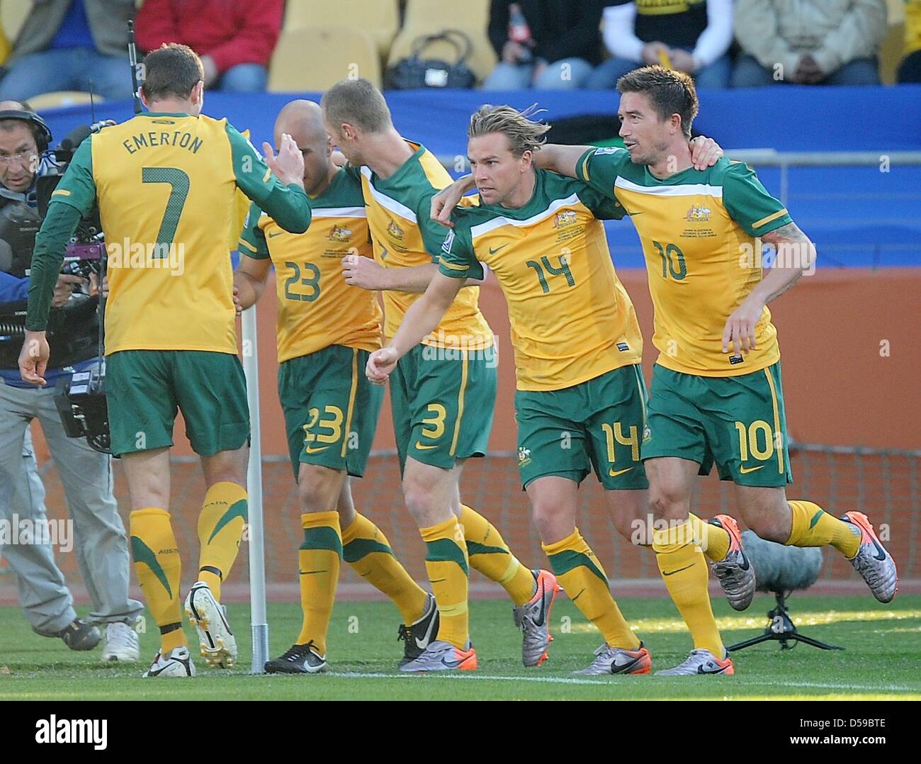 Brett Holman (2-R) of Australia celebrates with his teammates after ...