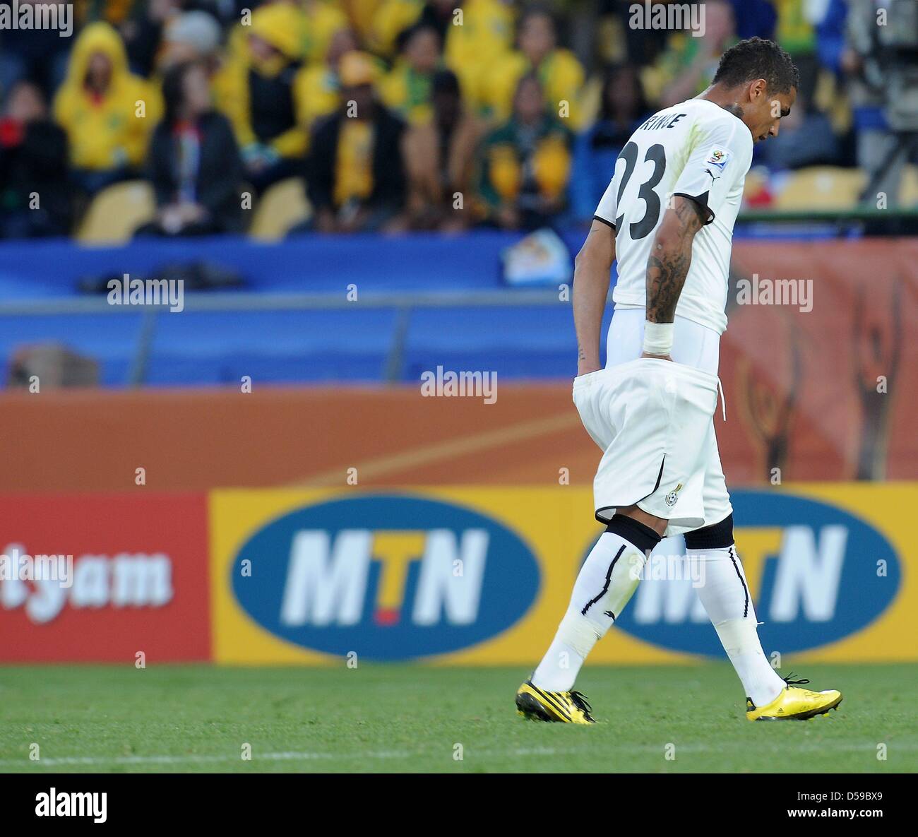 Ghana's Kevin Prince Boateng walks over the pitch with his hands down ...