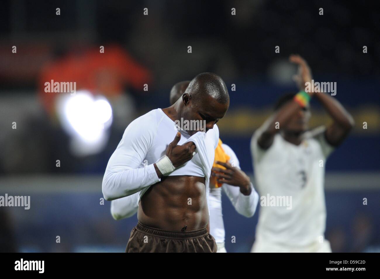 Ghana's goalkeeper Richard Kingson shows off his six pack after the ...