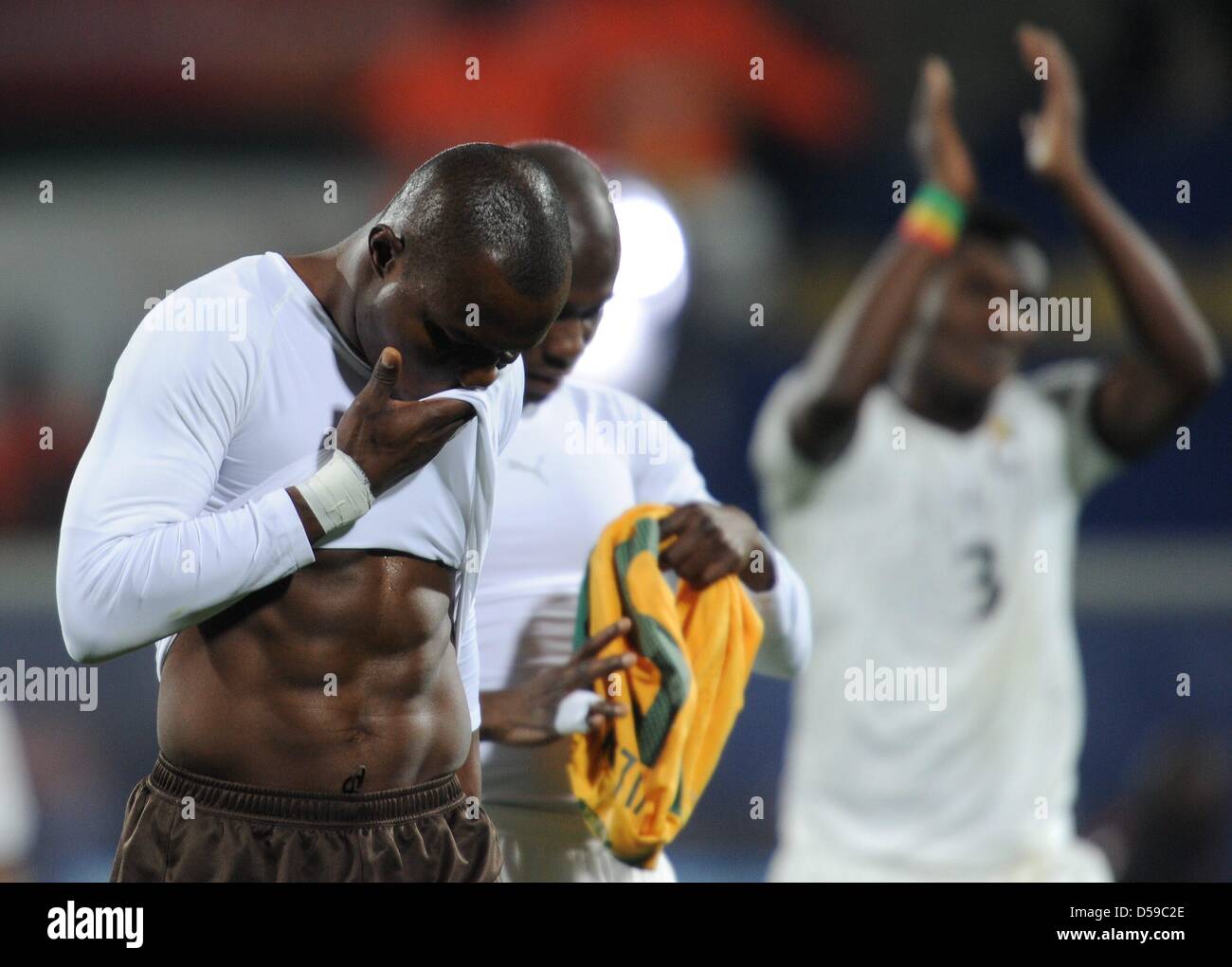 Ghana's goalkeeper Richard Kingson shows off his six pack after the ...
