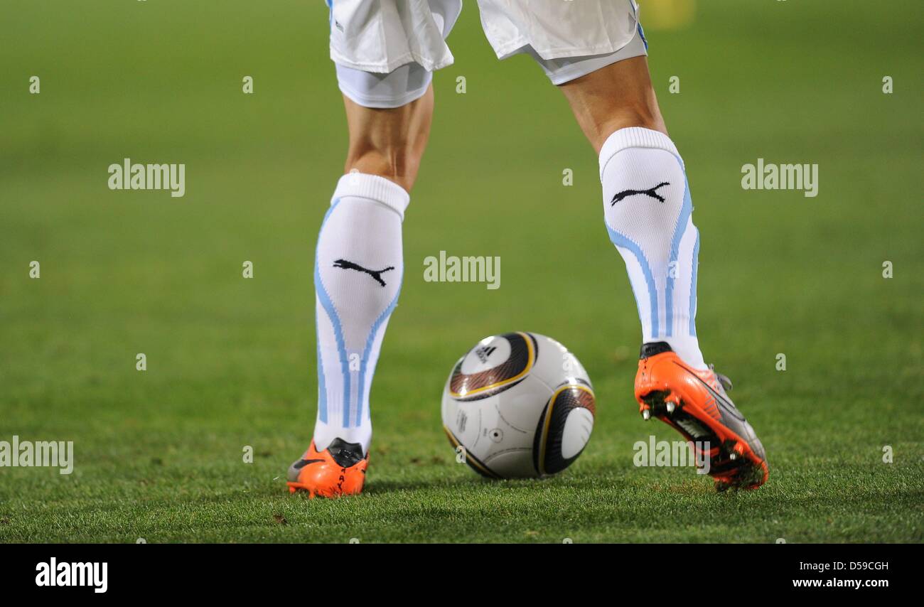 The legs of a Uruguayn player during the 2010 FIFA World Cup group A ...