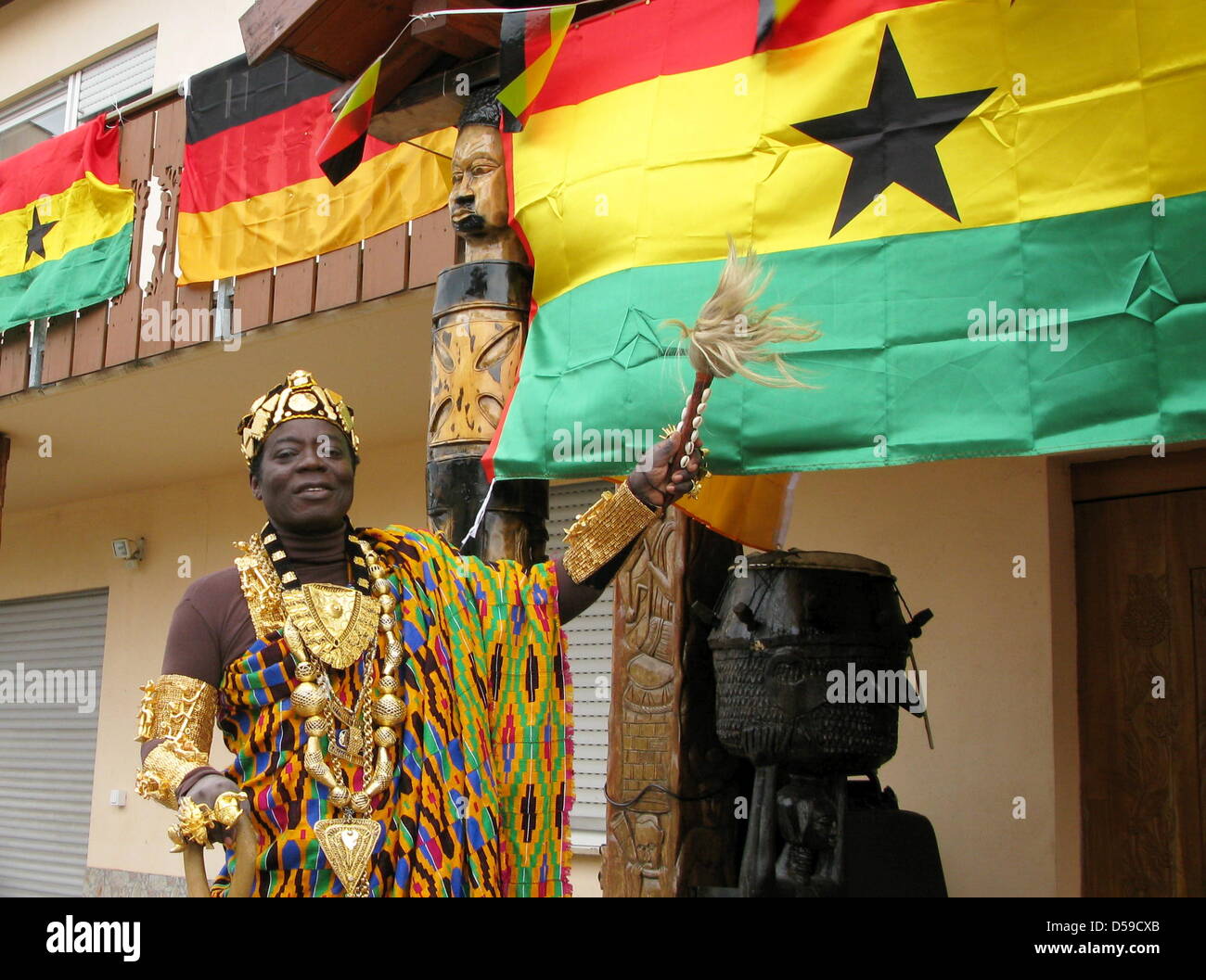 Ghanese king Cephas Bansah poses with a jersey of Ghana's national ...