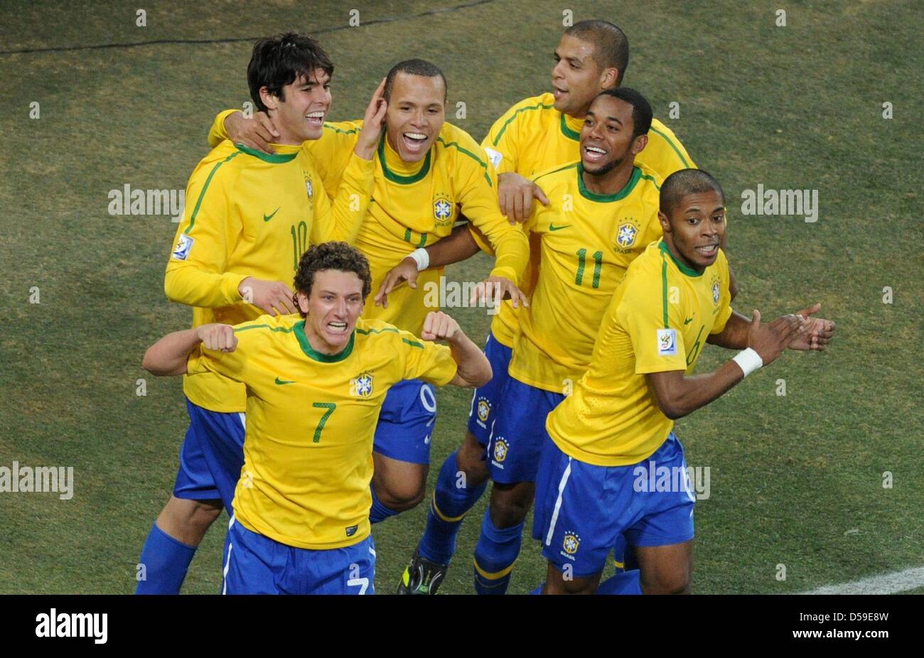 Brazil's Elano (7) celebrates scoring the 3-0 with team mates during ...