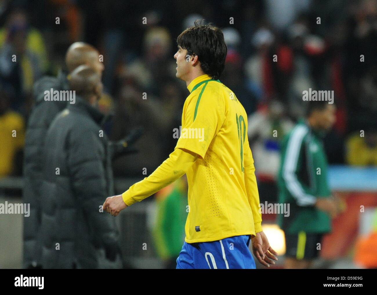 Kaka of Brazil leaves the pitch after receiving a yellow red card ...