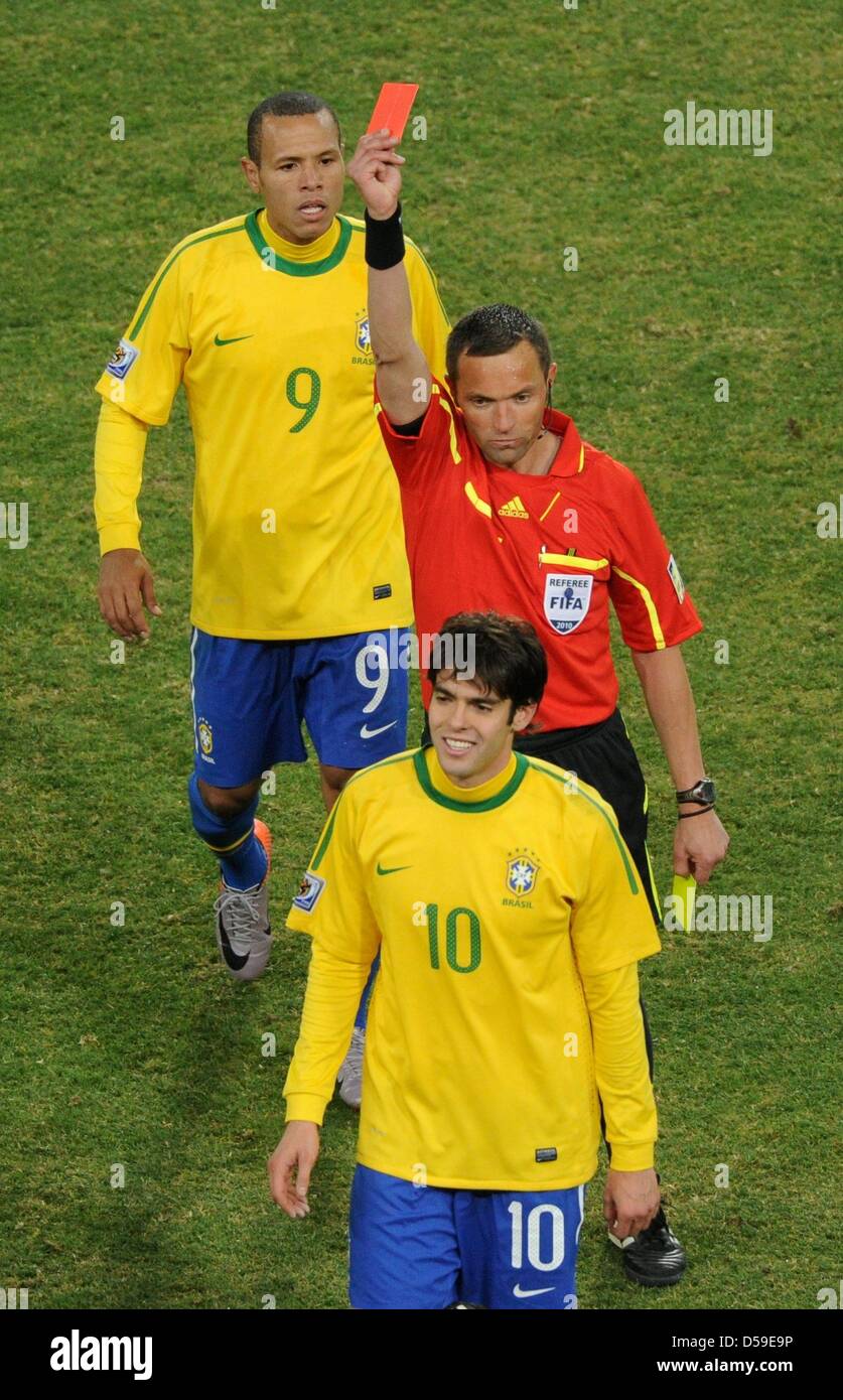 Brazil's Kaka leaves the pitch after being booked with the yellow-red ...