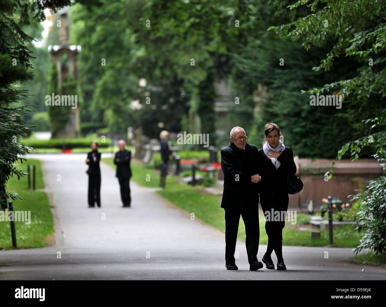 Relatives of deceased painter Sigmar Polke follow the coffin during the ...