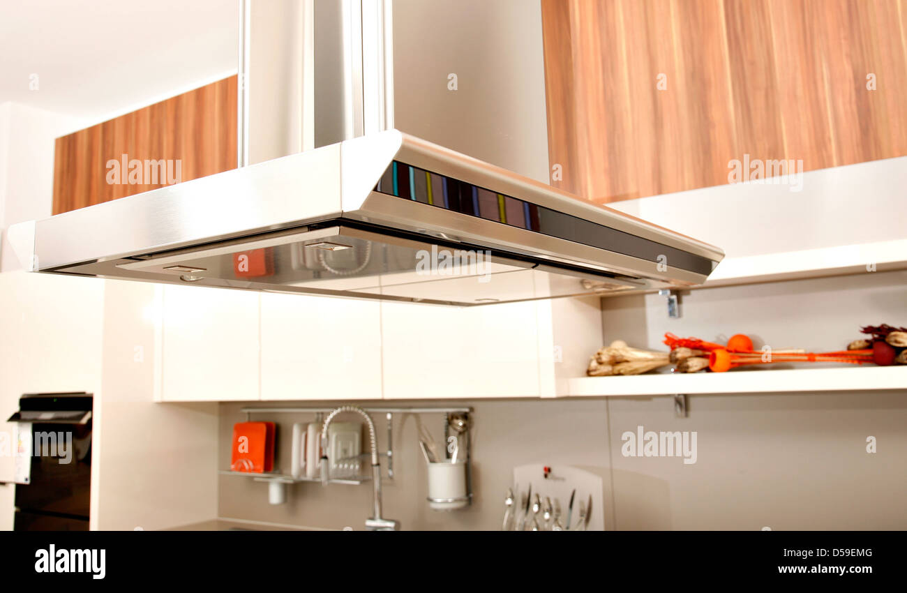 Modern cooker hood in a beautifully designed kitchen with appliances ...