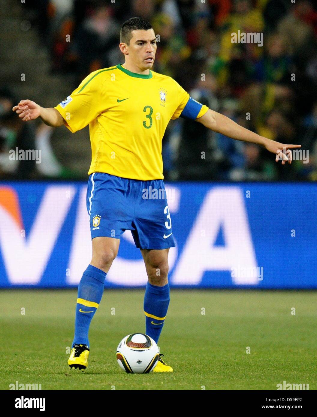 Lucio of Brazil controls the ball during the FIFA World Cup 2010 group ...