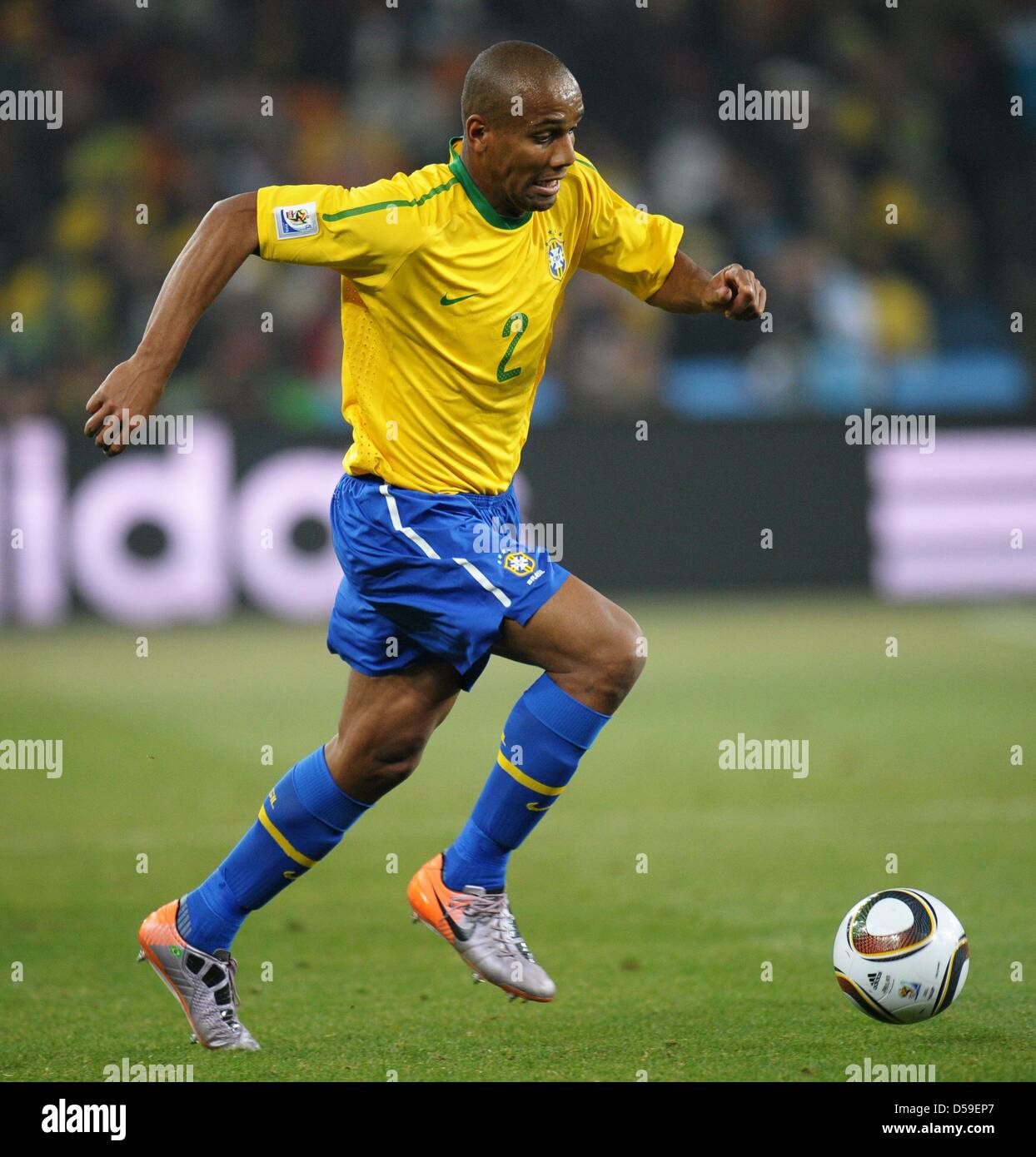 Maicon of Brazil controls the ball during the FIFA World Cup 2010 group ...