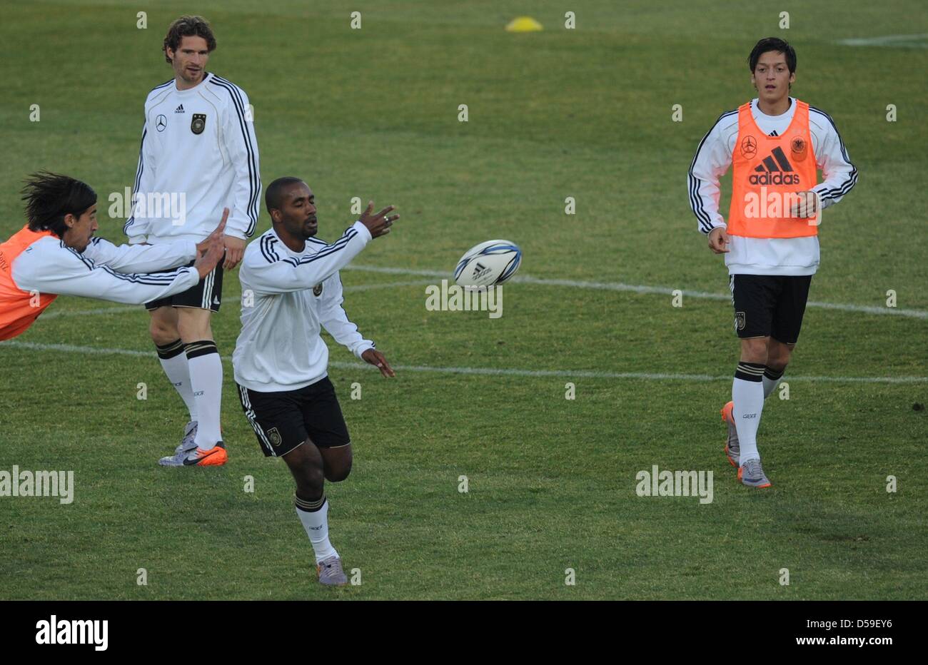 Germany's Sami Khedira (L-R), Arne Friedrich, Cacau and Mesut Oezil ...