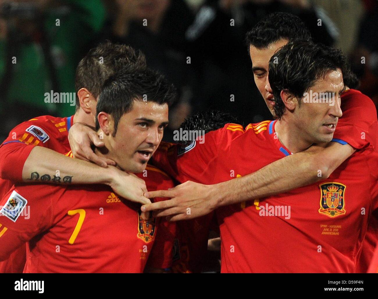 Spain's David Villa (L) celebrates scoring the 1-0 with team Joan ...