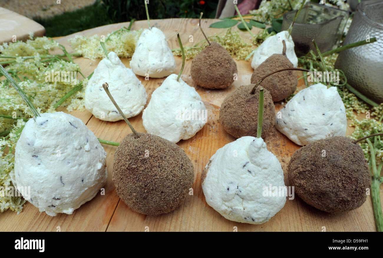 Elder pear mite cheese, aged three months, next to freshly prepared ...
