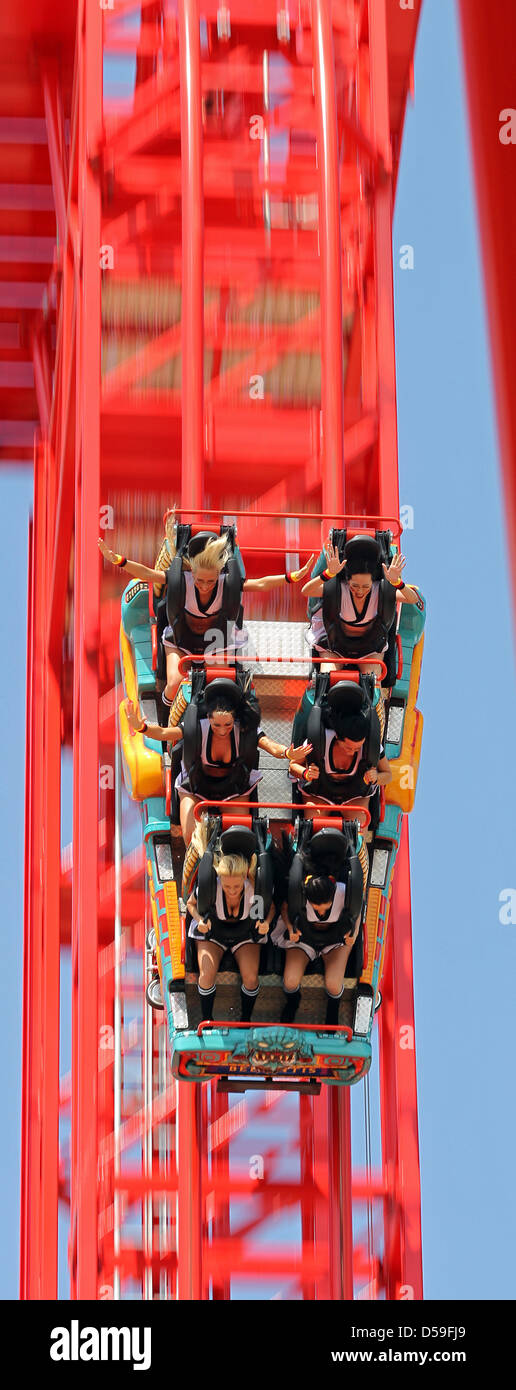 Visitors get a preview ride of the new rollercoaster 'Huracan' at the ...