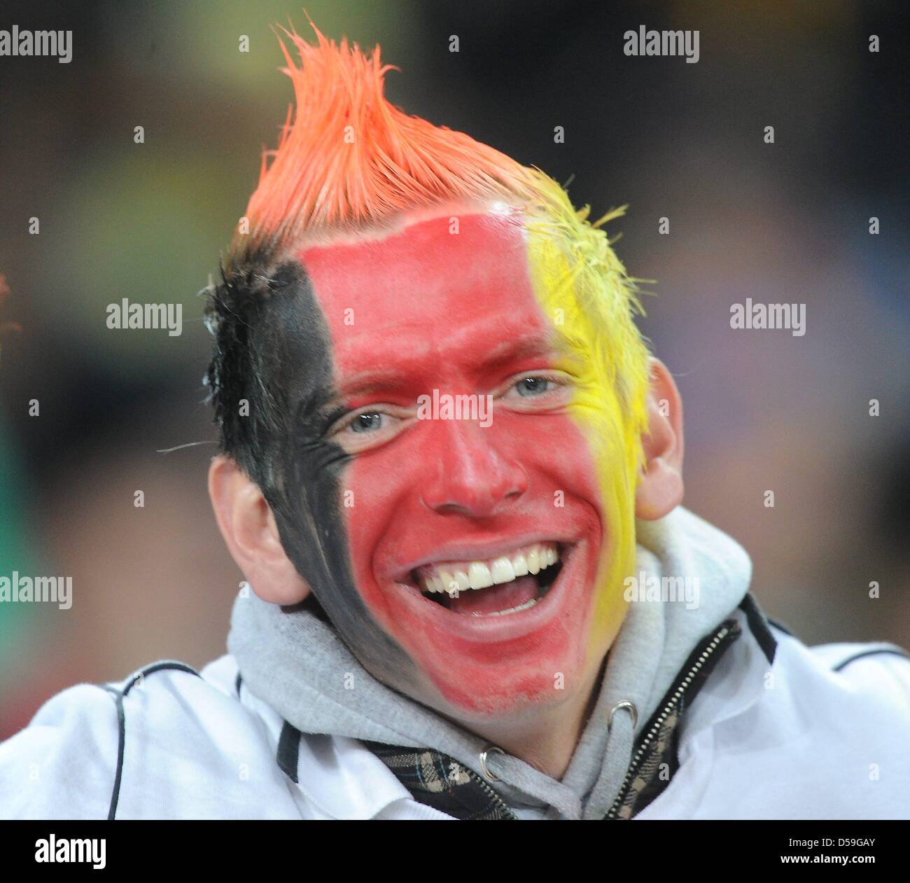 German fans celebrate on the stand during the 2010 FIFA World Cup group ...