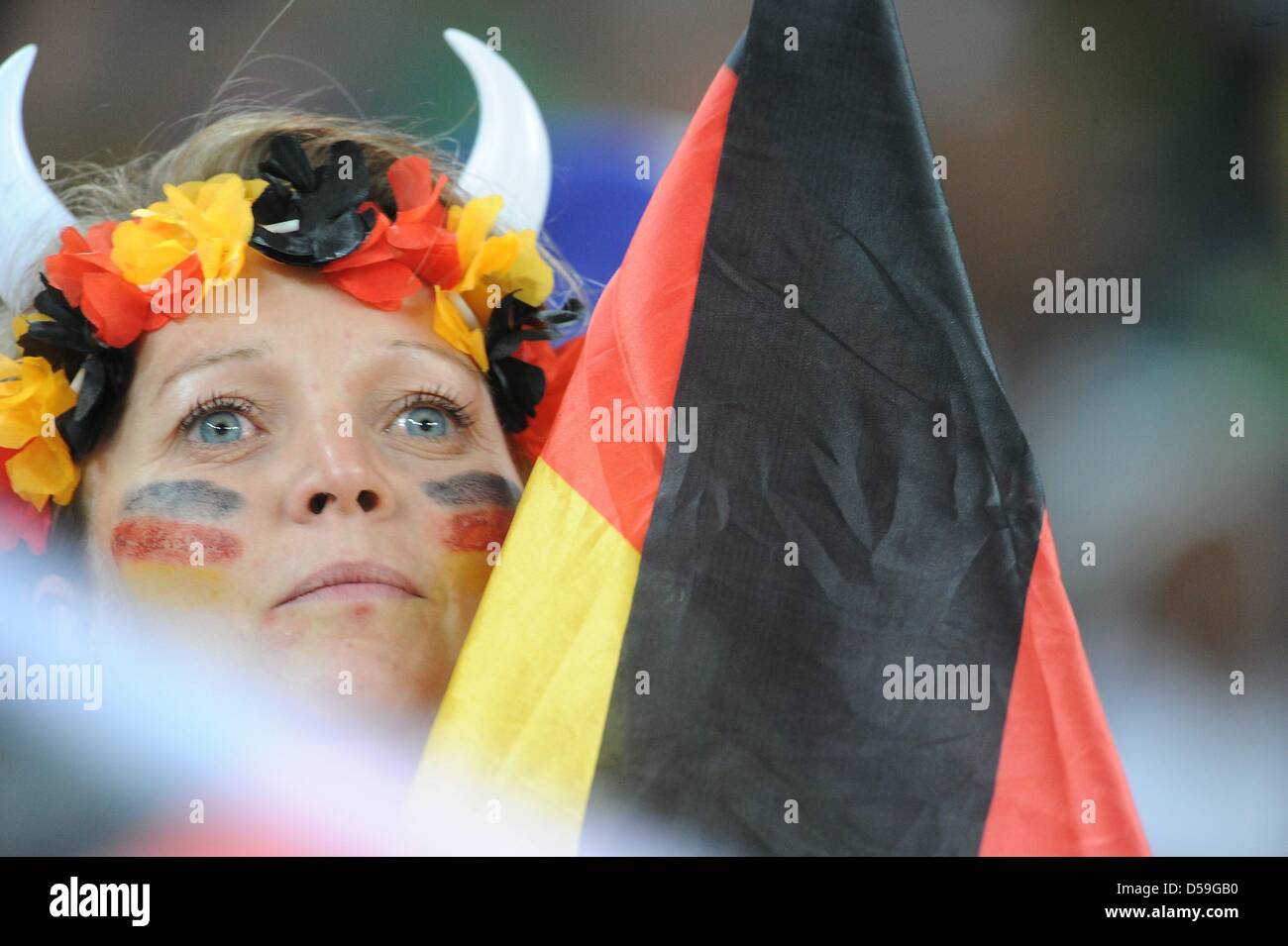 German fans celebrate on the stand during the 2010 FIFA World Cup group ...