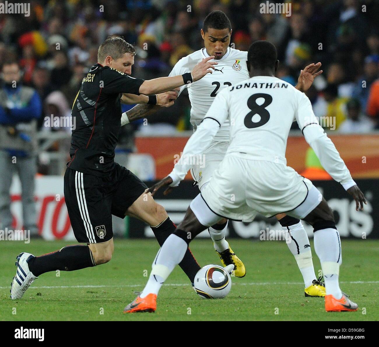 Germany's Bastian Schweinsteiger (L) and Ghana's Kevin Prince Boateng ...