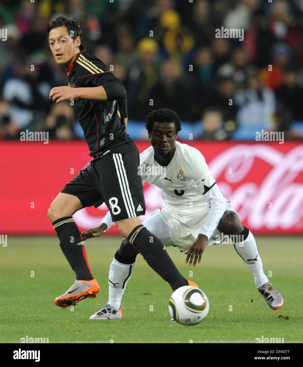 Anthony Annan (R) of Ghana vies with Mesut Oezil during the FIFA World ...