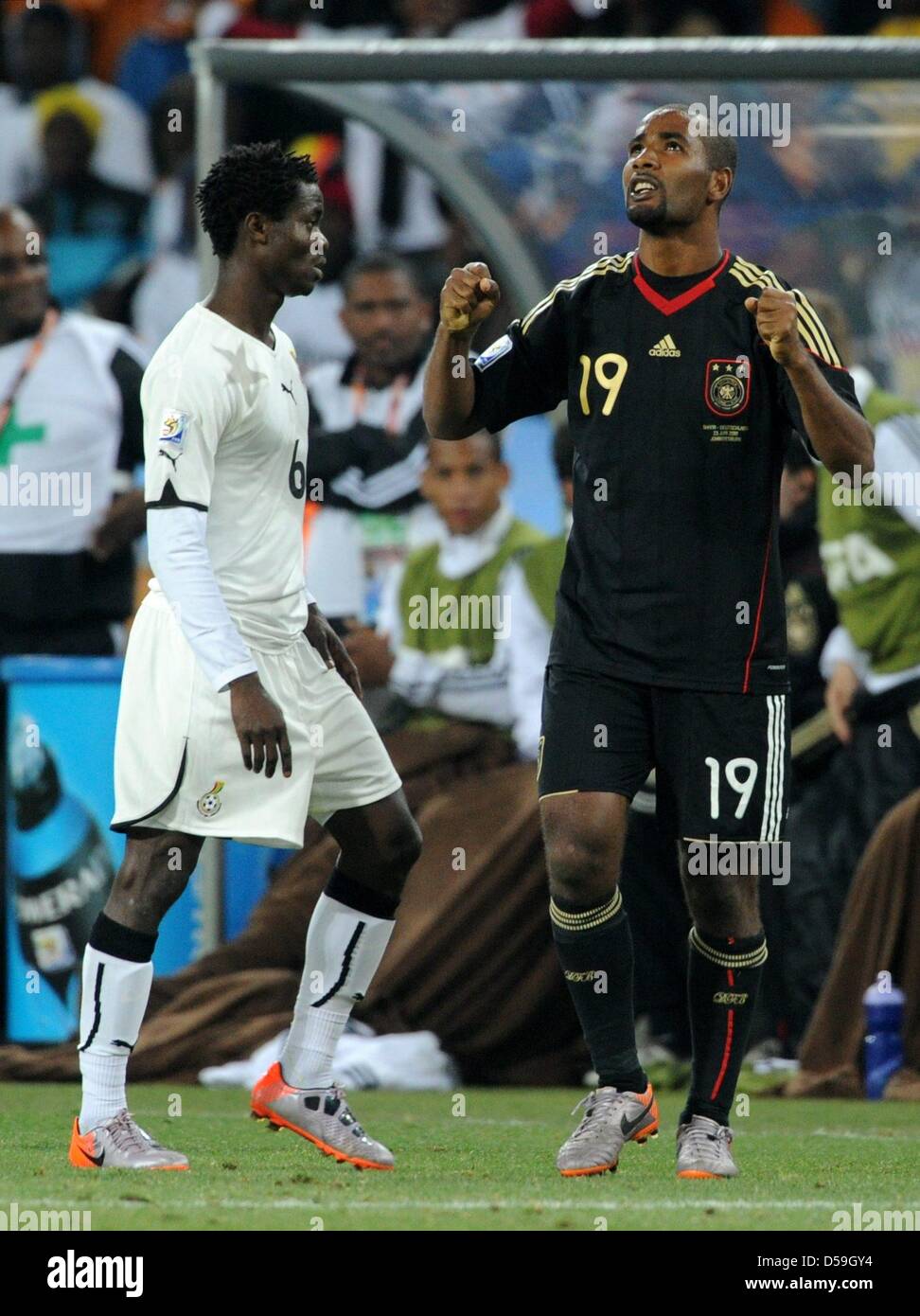 Germany's Cacau (R) celebrates next to Ghana's Anthony Annan after the ...