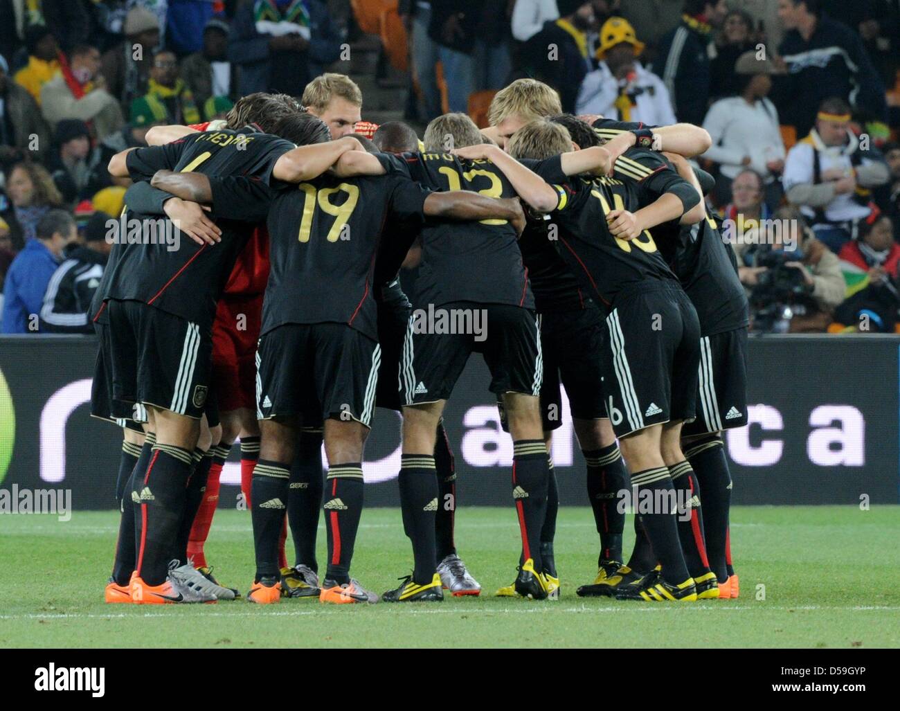 Germany's team stand in circle prior to the 2010 FIFA World Cup group D ...