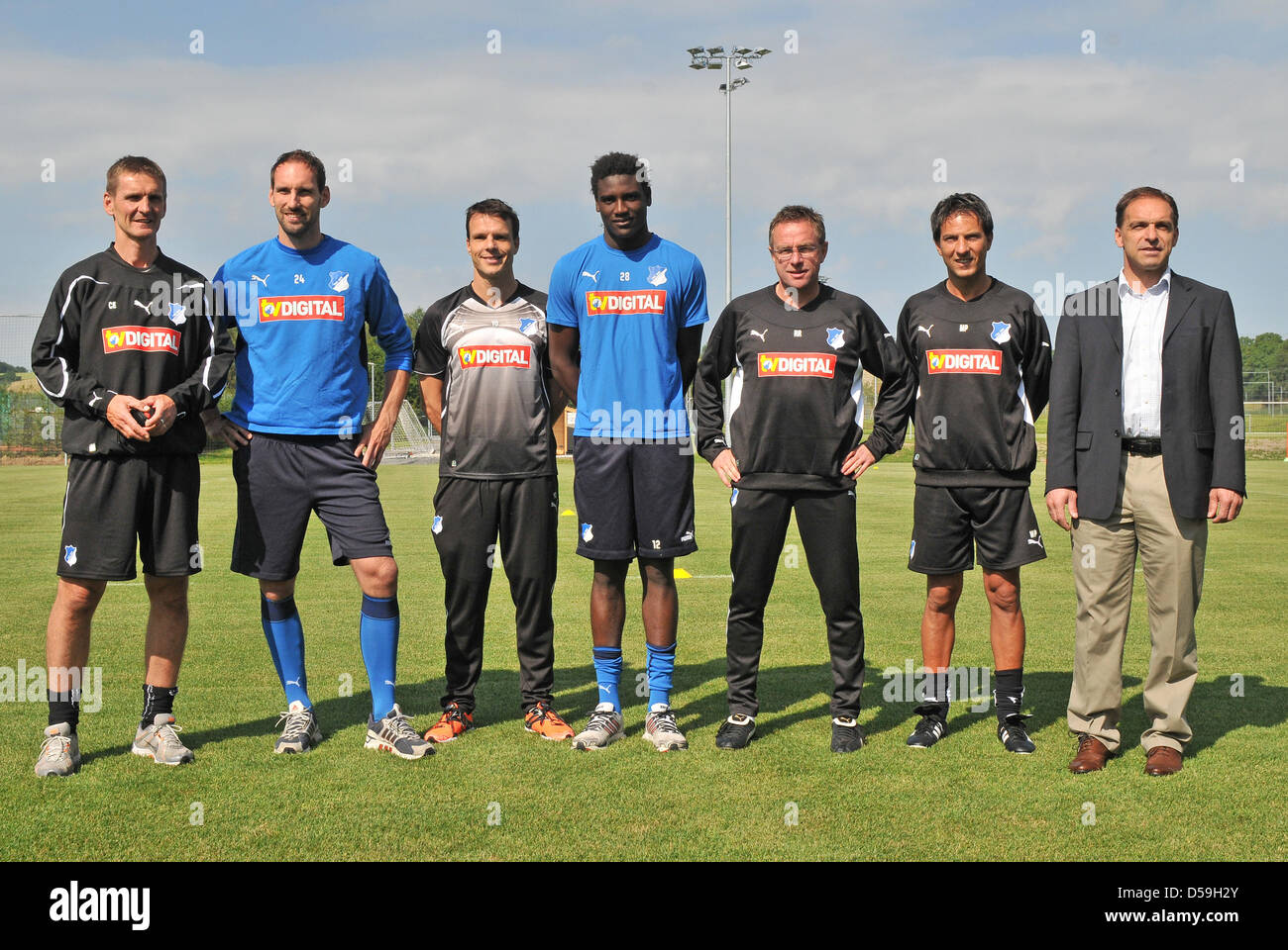 (L-R) Fitness coach Christof Elser, goalie Tom Starke, fitness coach ...