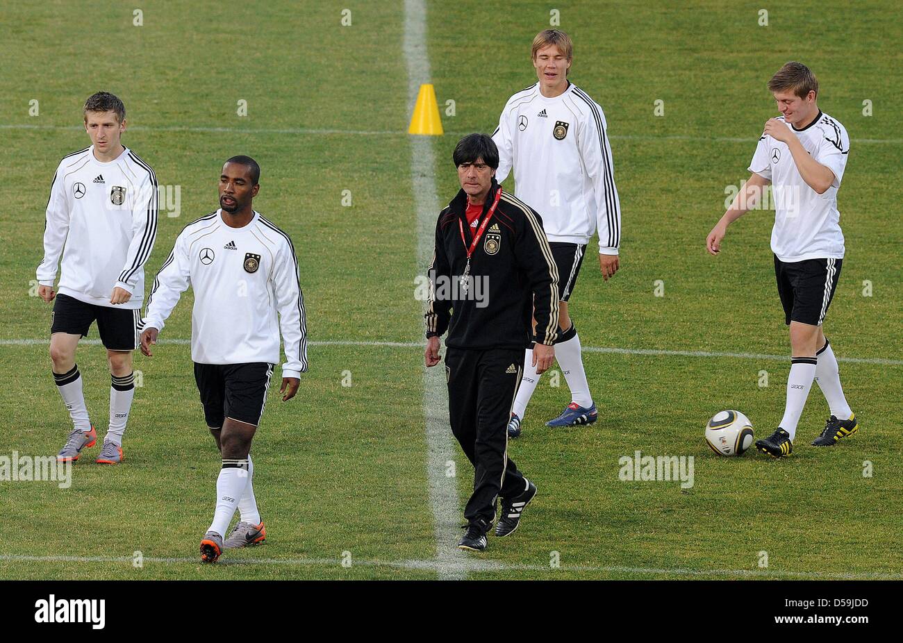 German coach Joachim Loew (C) and players Marko Marin (L-R), Cacau ...
