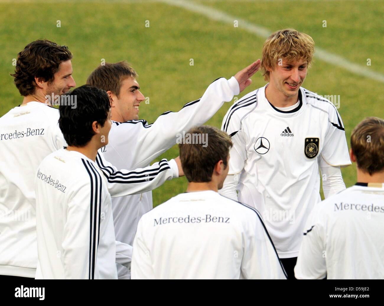 German players Arne Friedrich (L), Philipp Lahm (3-L), and Stefan ...